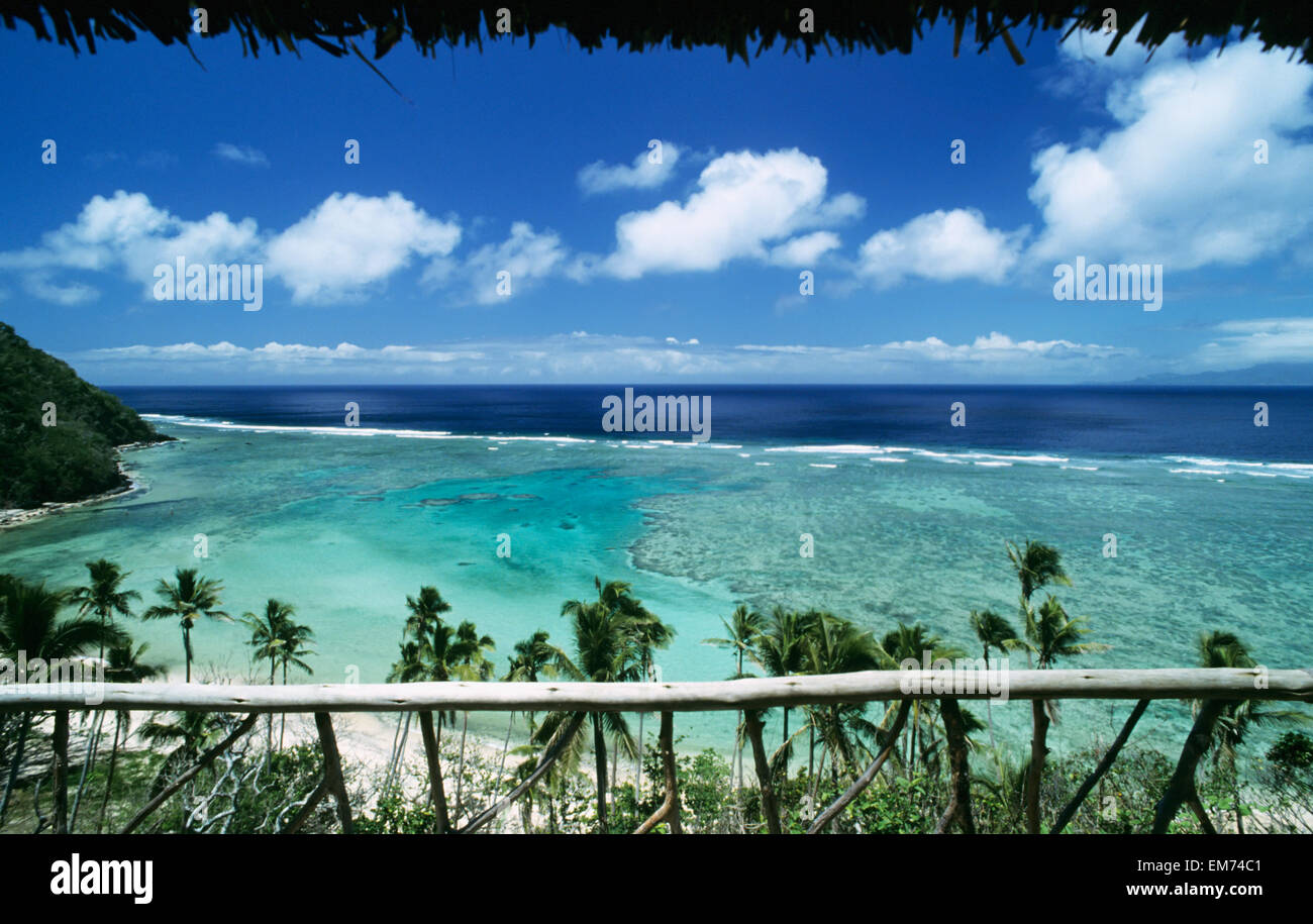 Fiji, Ocean's view framed by railing and thatched roof; Wakaya Island ...