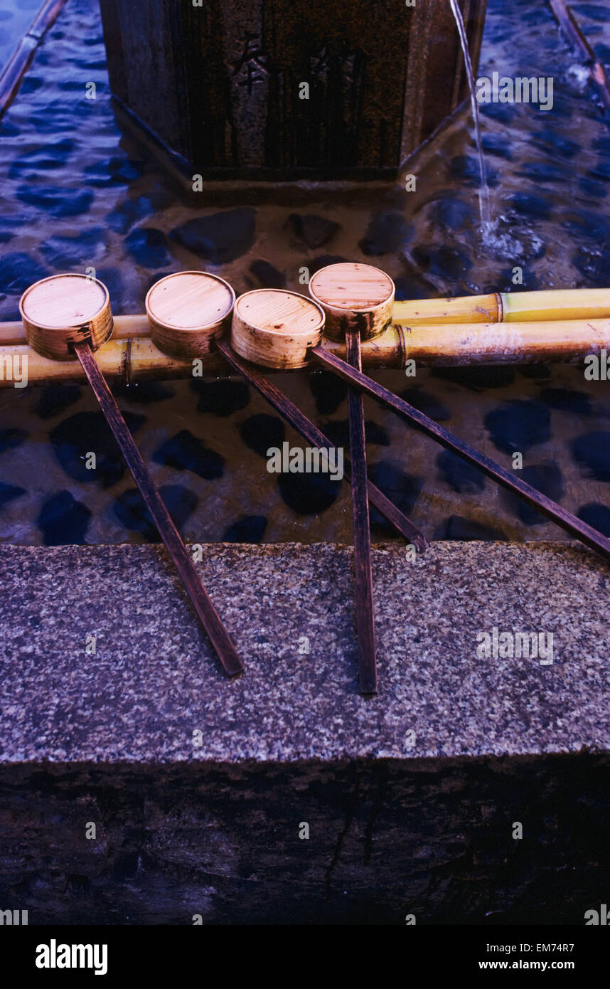Japan, Bamboo Water Dippers Next To Fountain Stock Photo - Alamy