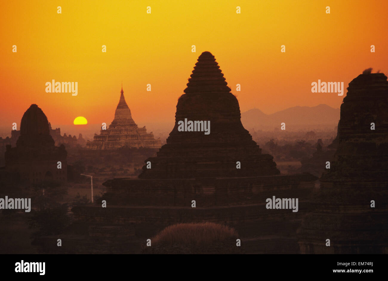 Burma (Myanmar), Bagan, Shwesandaw Paya, Temples Silhouetted Against Orange Sunset Stock Photo ...