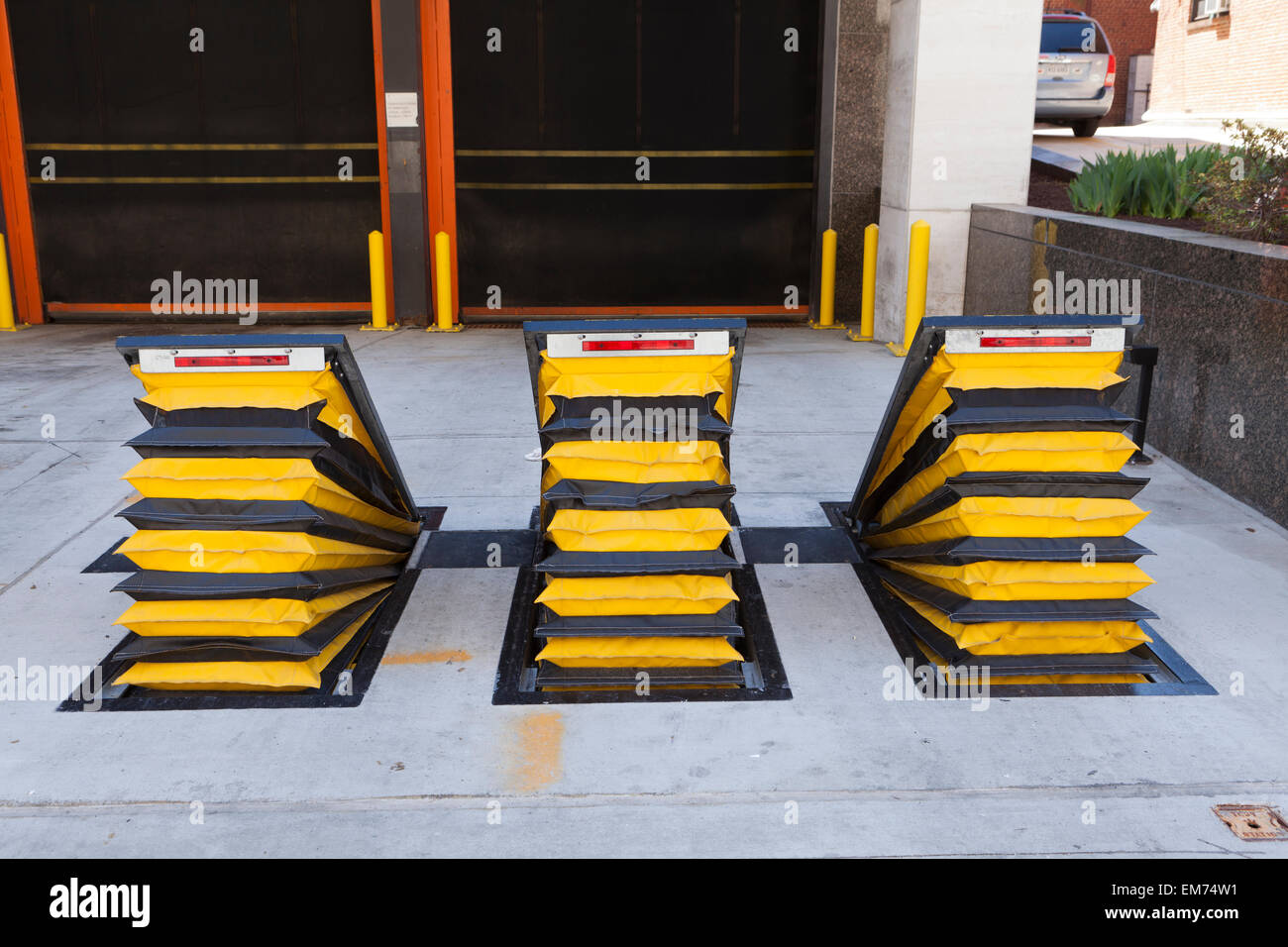 Wedge barrier vehicle barricades at US Federal building loading dock ...
