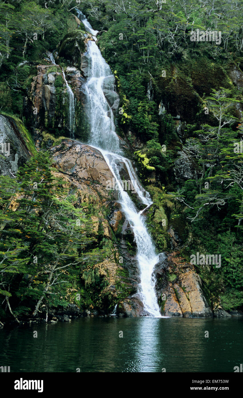 Chile, Waterfall cascading from Isla Hoste; Beagle Channel Stock Photo ...