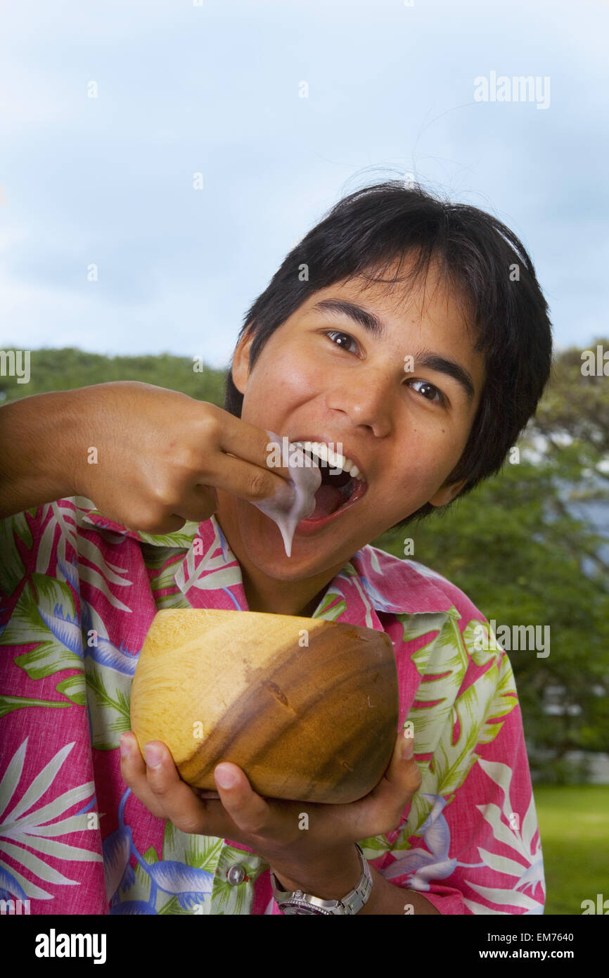 Young man with aloha shirt hi-res stock photography and images - Alamy