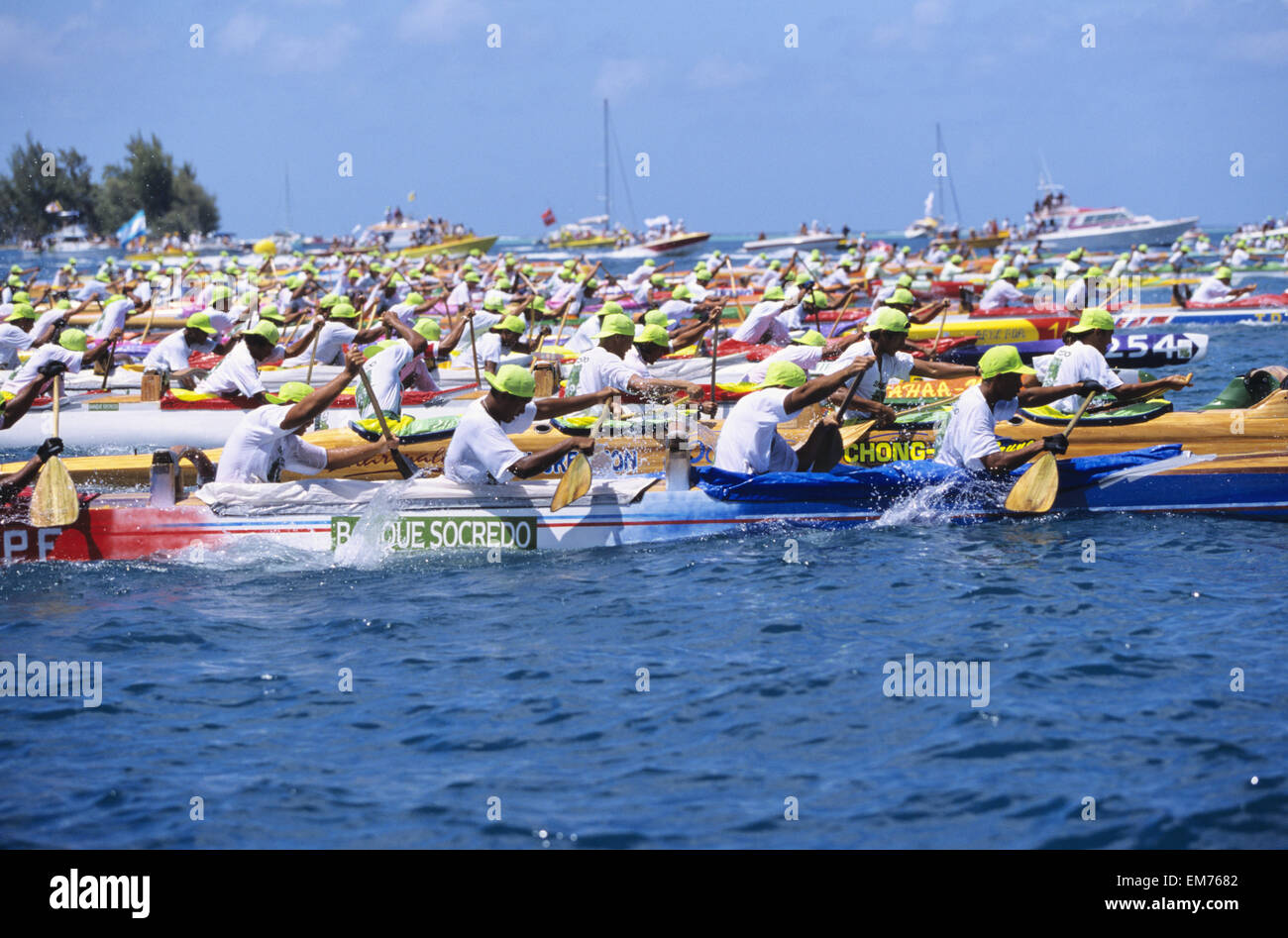 French Polynesia, Tahiti, Many Men Paddling Canoes At Start Of Race ...