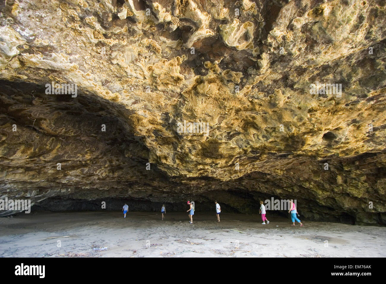USA, Hawaii Islands, Kauai, People exploring caves; Maniniholo Dry ...