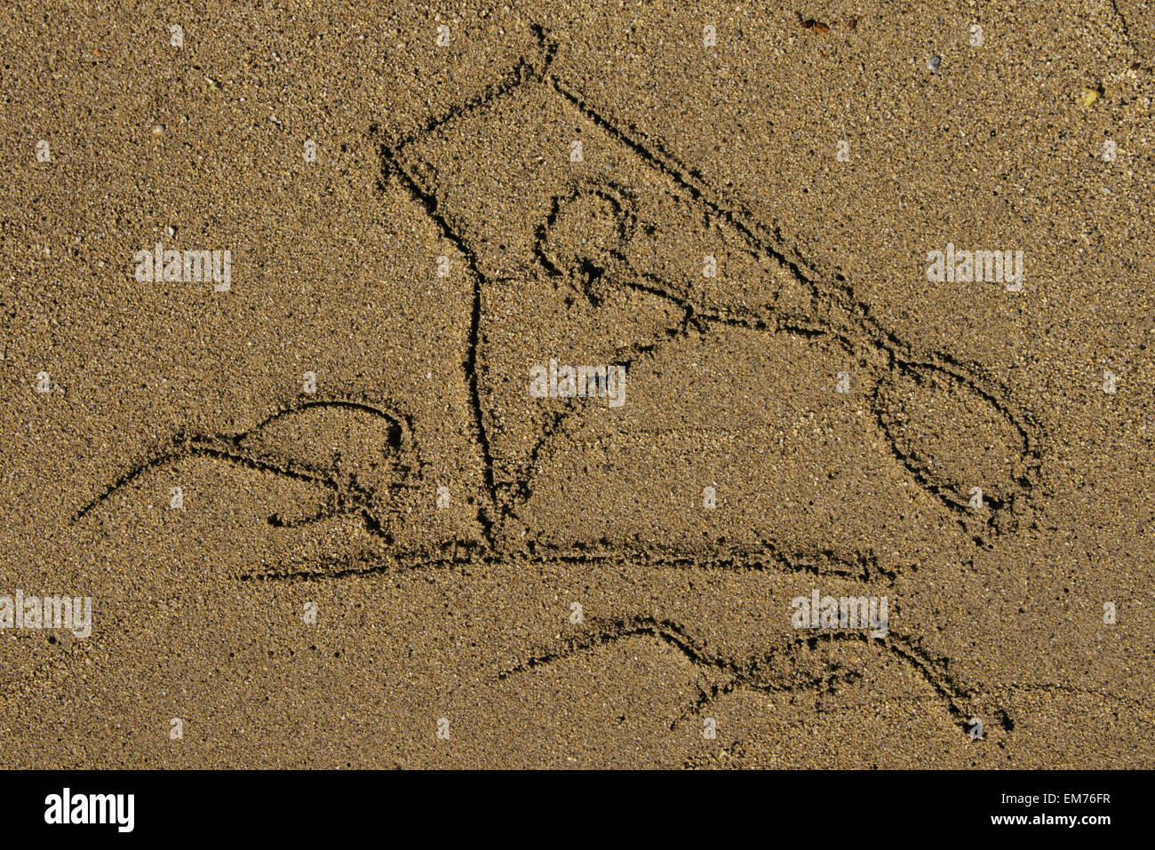 Drawing In Sand, Tribal Sketch Of Person Paddling In Ocean Stock Photo ...
