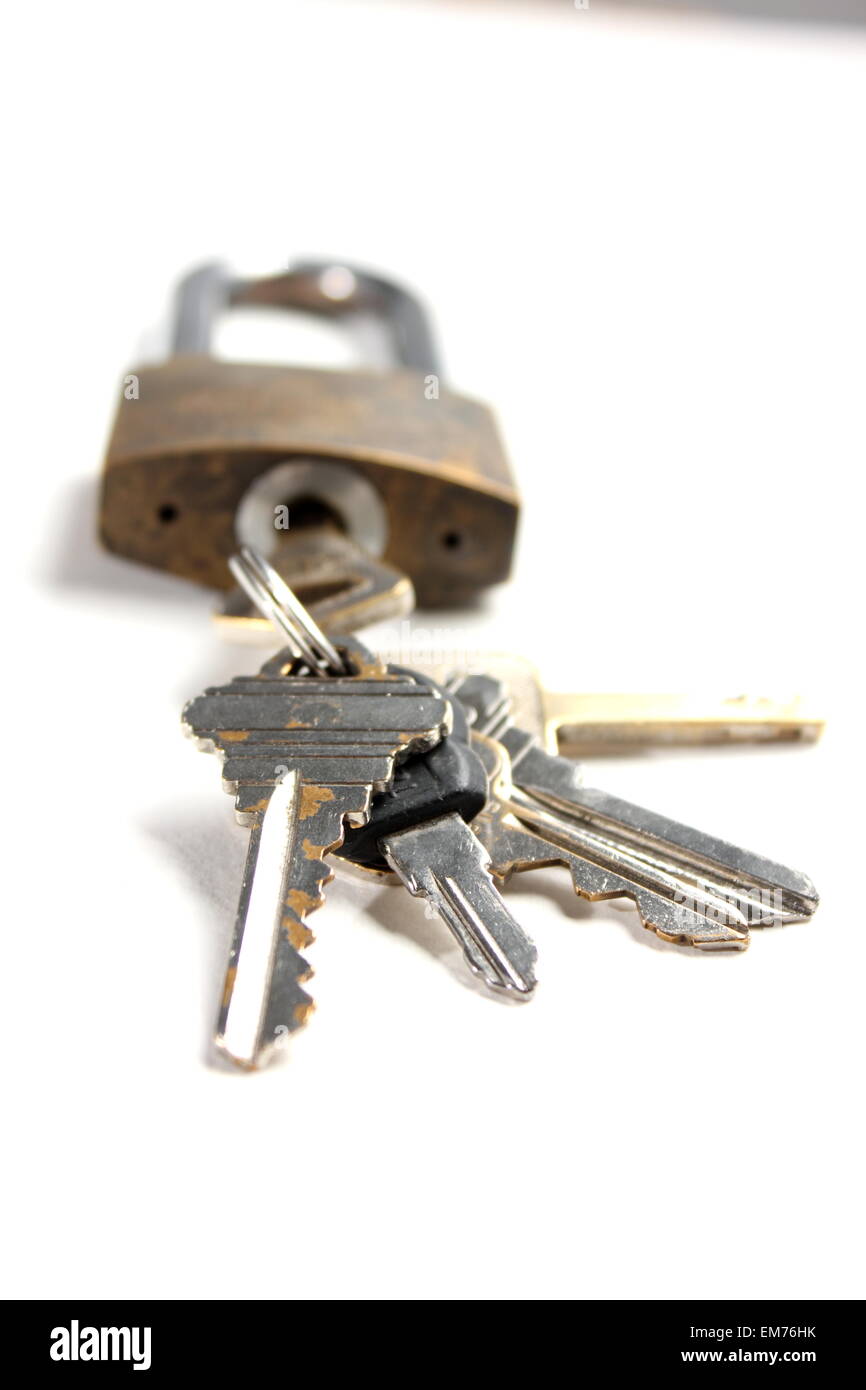 Closeup image of lock and key on white Stock Photo - Alamy