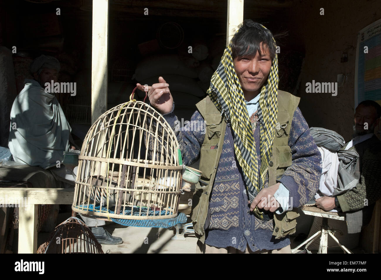 Hazara Man Holding A Bird Cage At The Bazaar In Bamiyan, Bamian ...