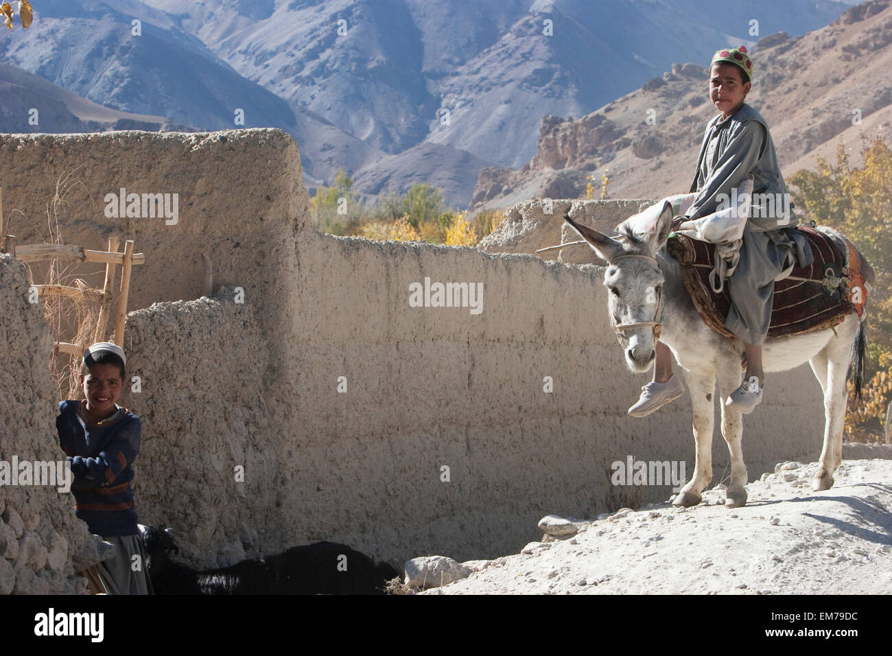 Afghan Boy On A Donkey Visiting Another Boy Near Shekh Ali, Parwan ...