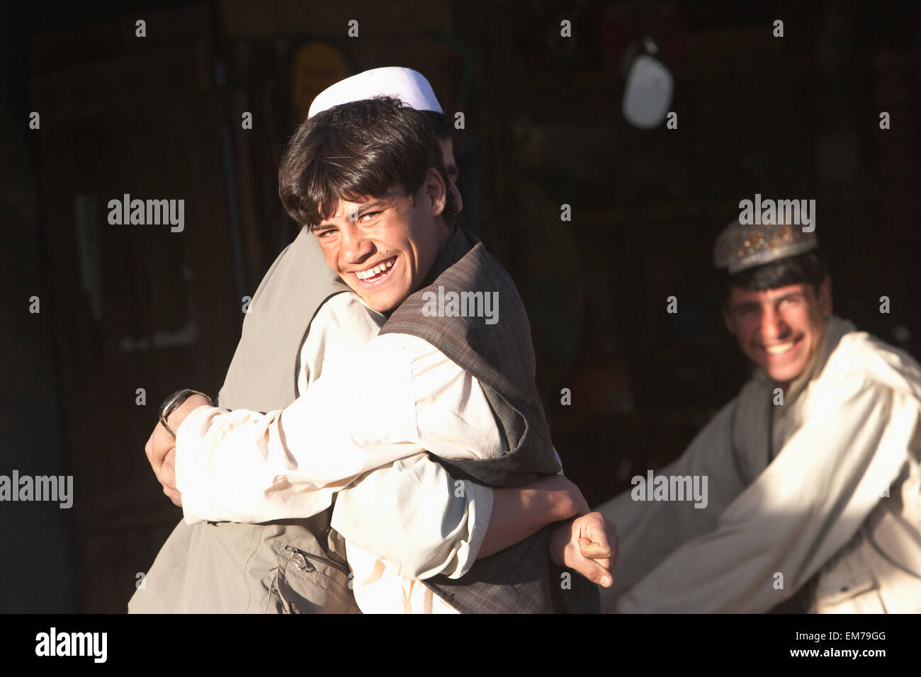 Young Afghan Men Wrestling In A Store In Jalrez, Vardak Province ...