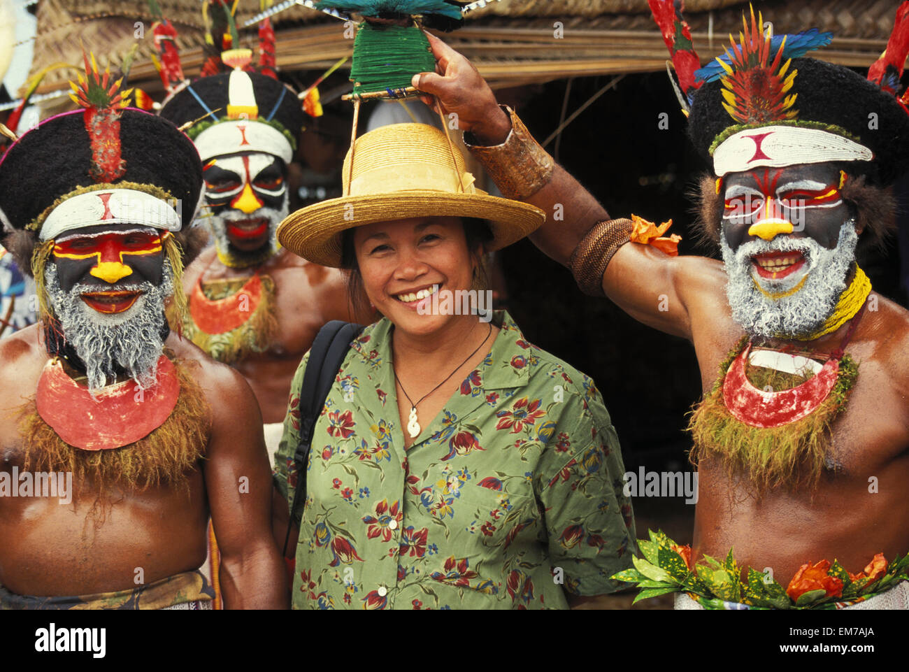 Papua New Guinea, Three Native Men With Traditional Face Paint Pose ...
