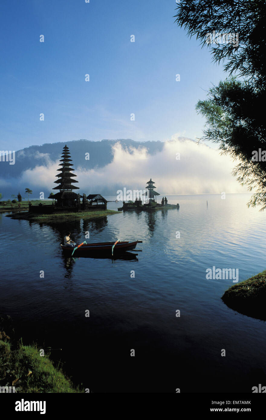 Indonesia, Bali, Ulu Danu Temple At Sunrise, Canoe Paddling On Water No ...