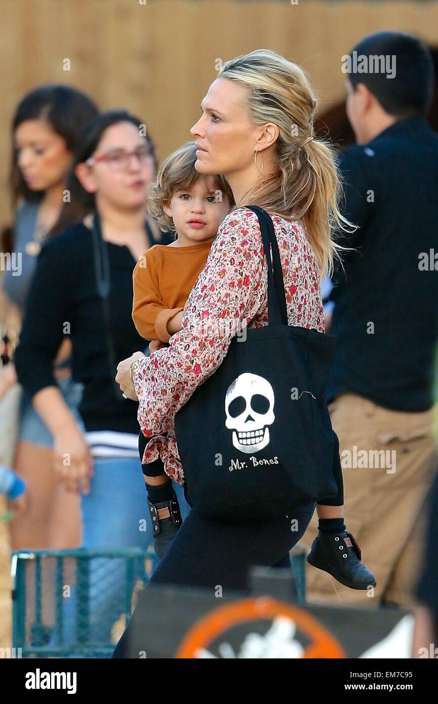 Molly Sims and husband Scott Stuber take their son, Brooks to Mr. Bones ...