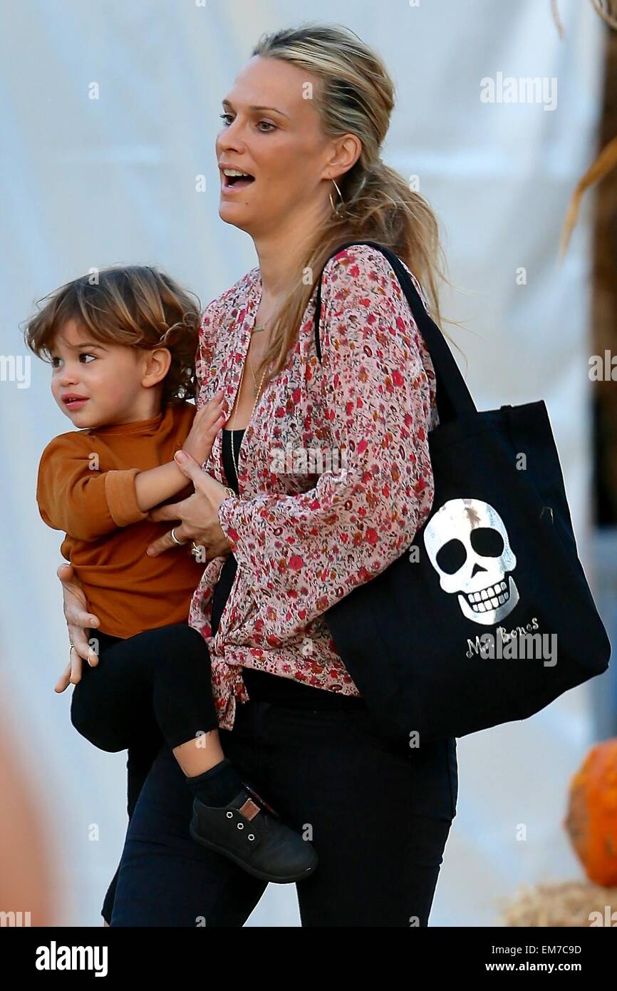Molly Sims and husband Scott Stuber take their son, Brooks to Mr. Bones ...