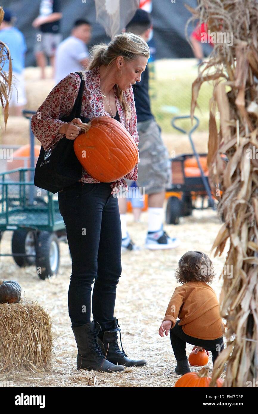 Molly Sims and husband Scott Stuber take their son, Brooks to Mr. Bones ...