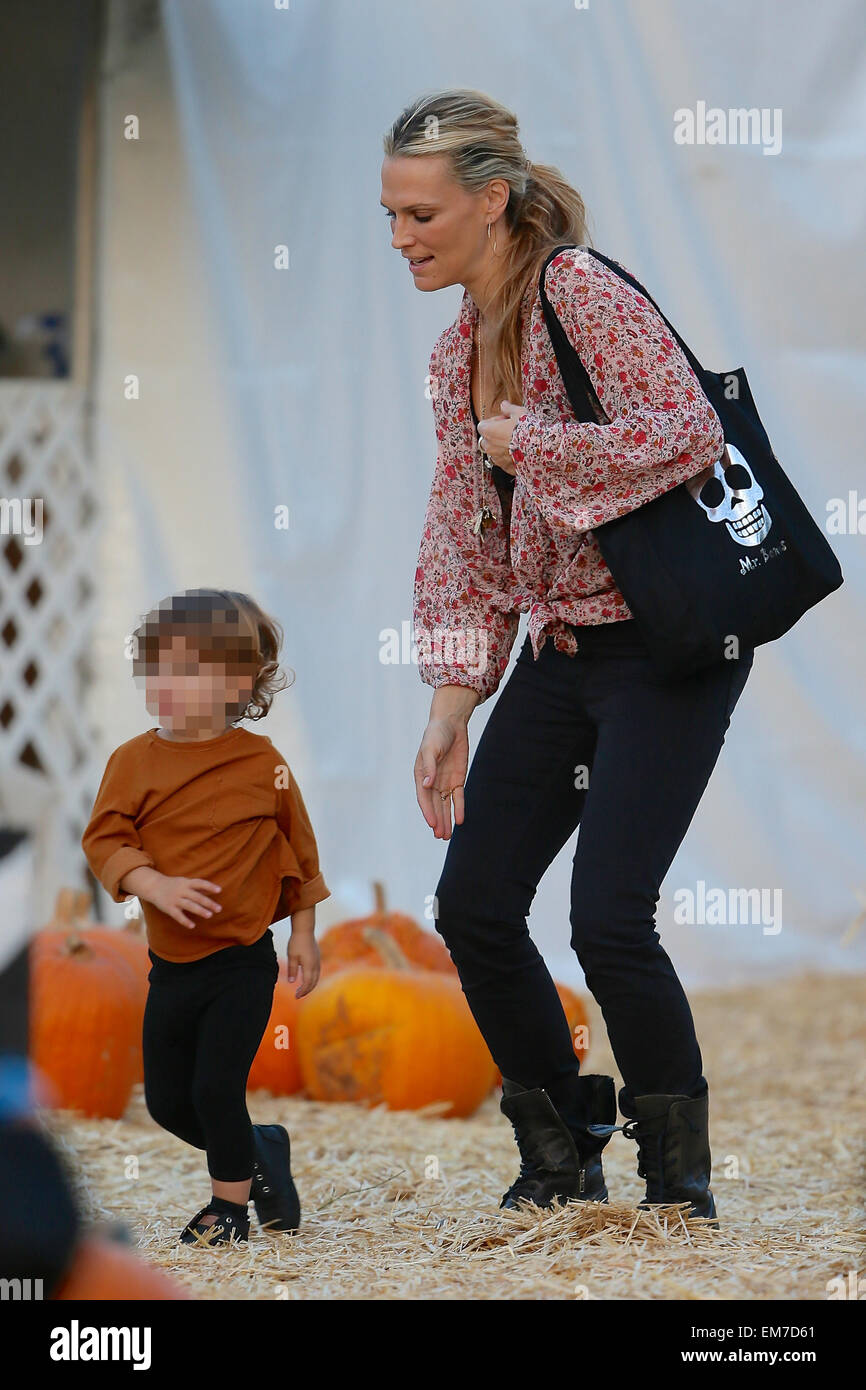 Molly Sims and husband Scott Stuber take their son, Brooks to Mr. Bones ...
