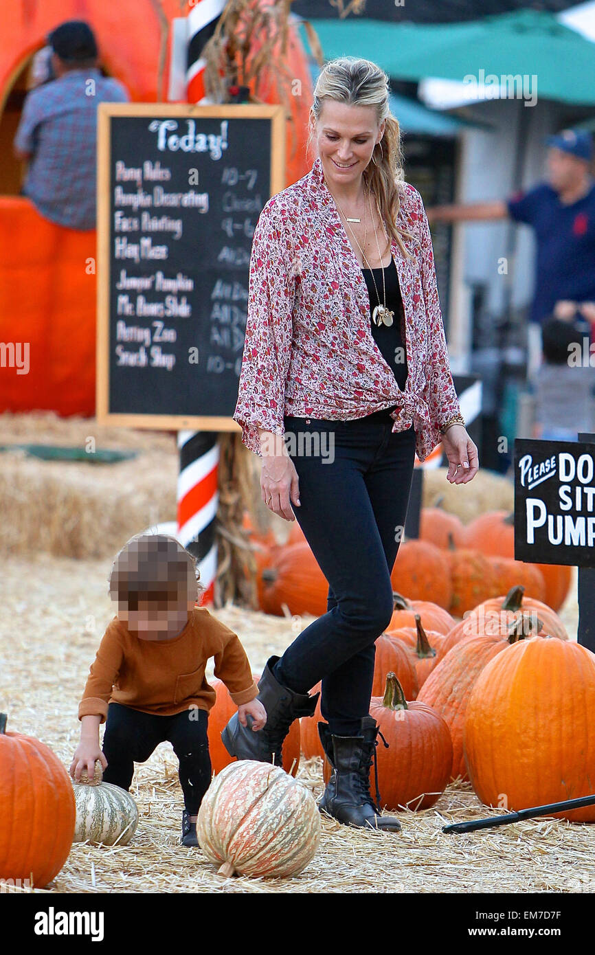 Molly Sims and husband Scott Stuber take their son, Brooks to Mr. Bones ...