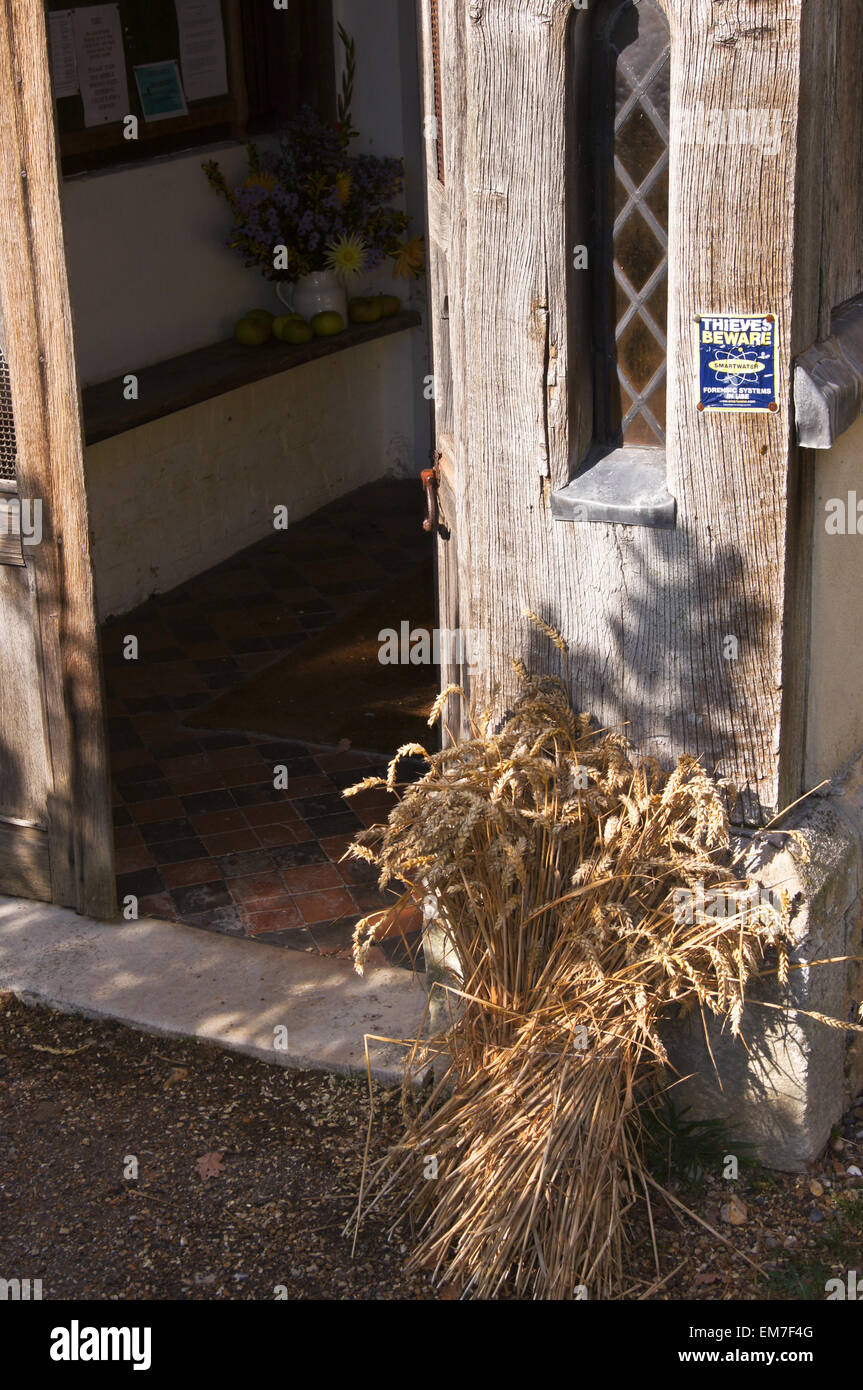 Harvest festival sheaf of corn in the porch of St. Mary's church ...