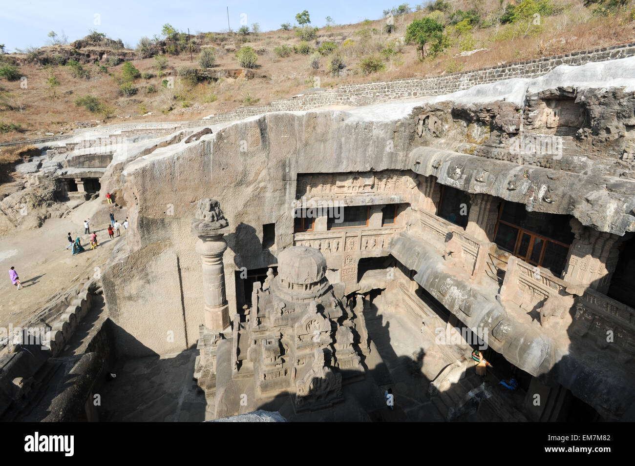 Ellora, India - 5 February 2015: People visiting on walking the cave ...