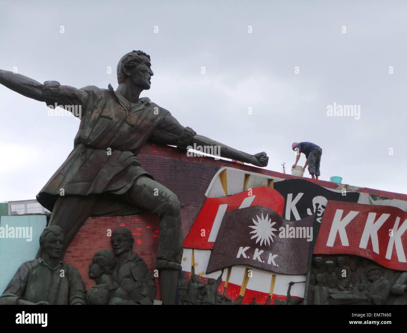 Manila, Philippines. 17th Apr, 2015. A man cleaning the mural of ...
