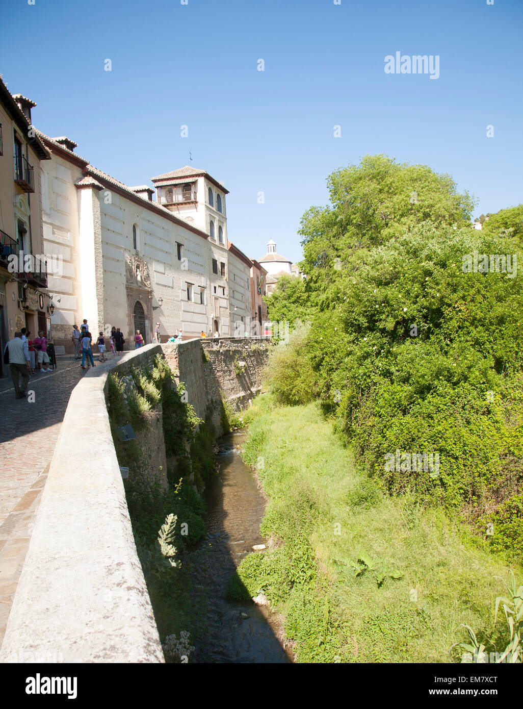 Historic street and buildings by the River Rio Darro, Granada, Spain ...