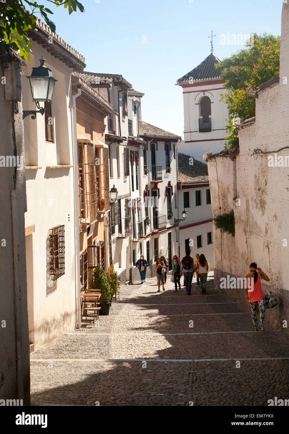People walking narrow streets Albaicin district, Granada, Spain Stock ...