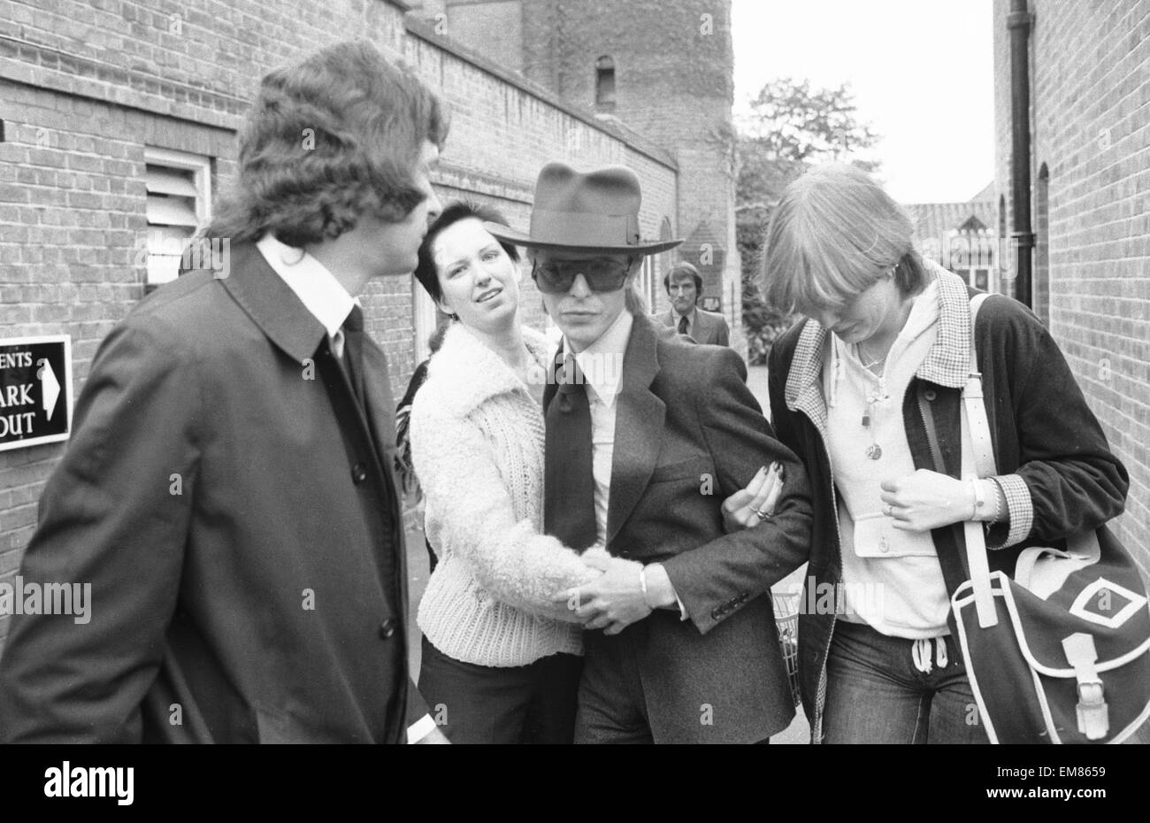 David Bowie seen here with other mourners at the funeral of Marc Bolan ...