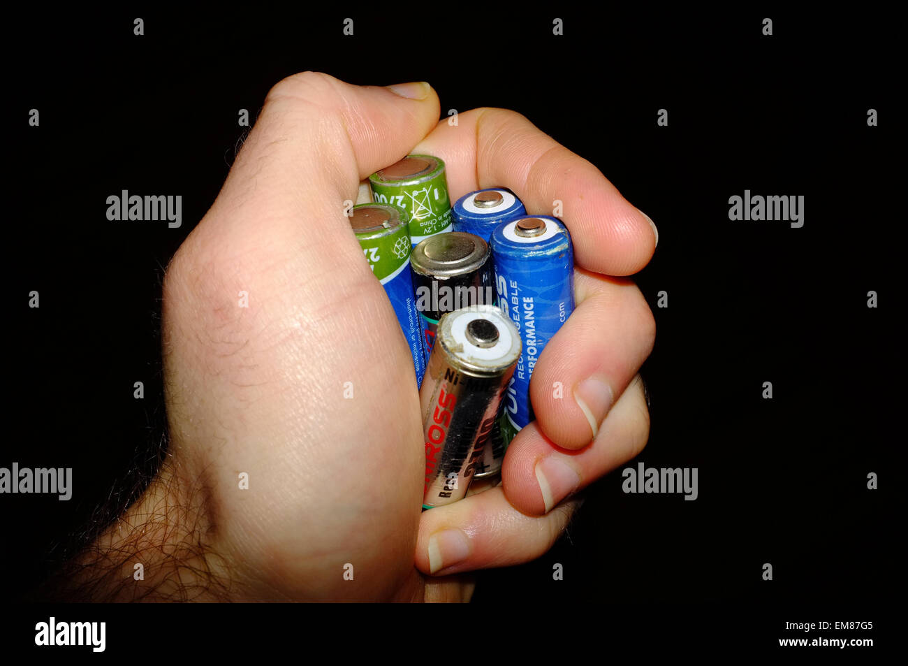 Fist of batteries hi-res stock photography and images - Alamy