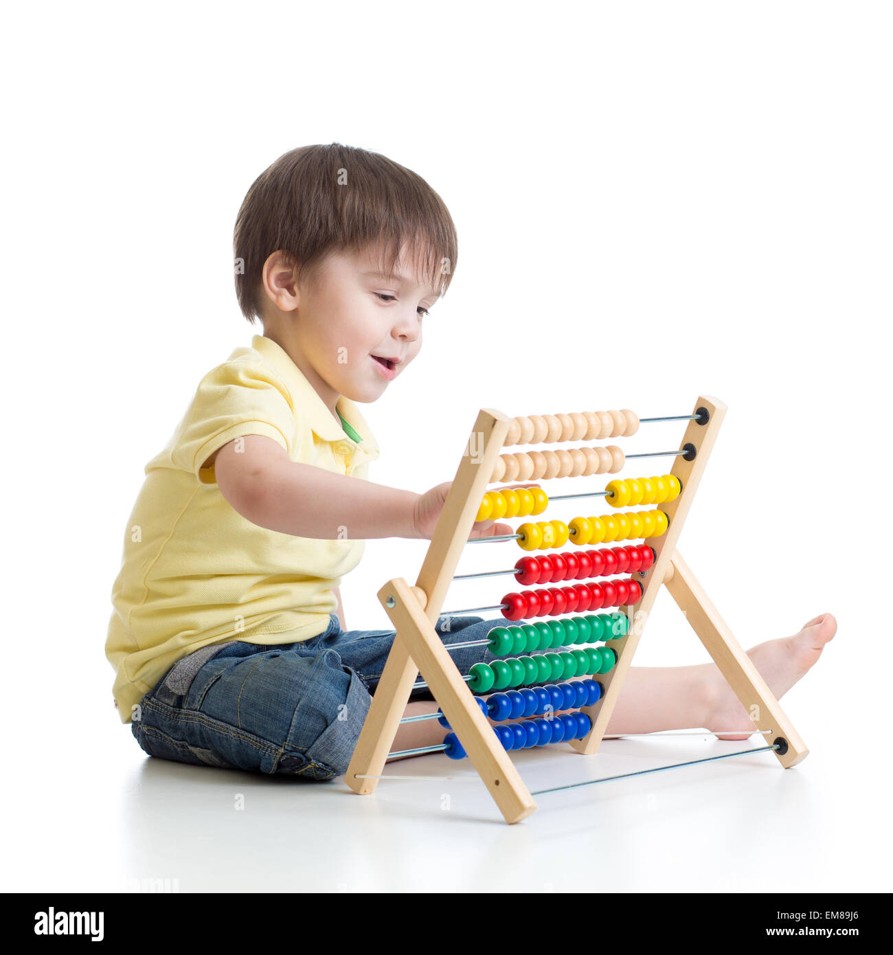 Child playing with abacus toy Stock Photo - Alamy