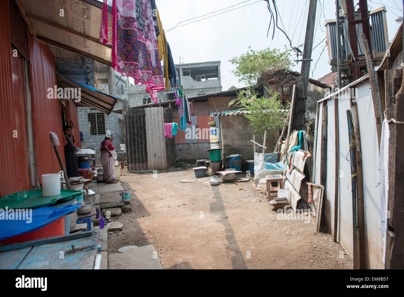 Woman standing in her yard in Fort Kochi, Kerala India Stock Photo - Alamy