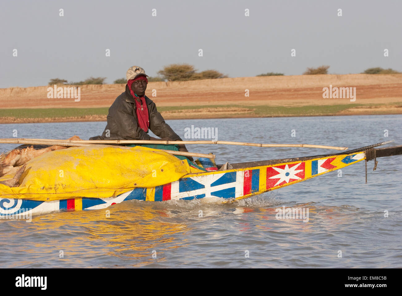 Man on a boat on the Niger River between Lake Debo and Sebi, Mali Stock ...