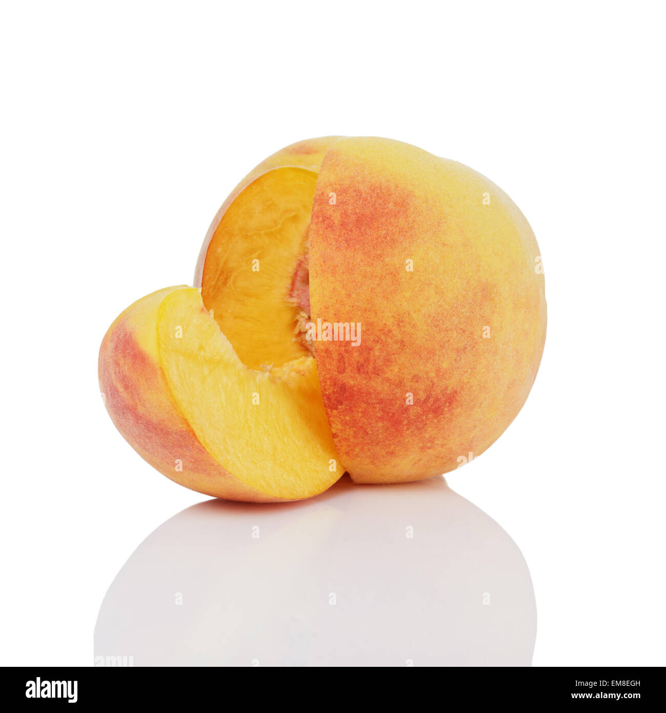 ripe peach with one segment cut out isolated Stock Photo - Alamy