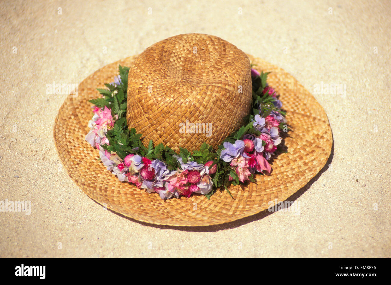 Straw Hat With Flower Rim Stock Photo - Alamy