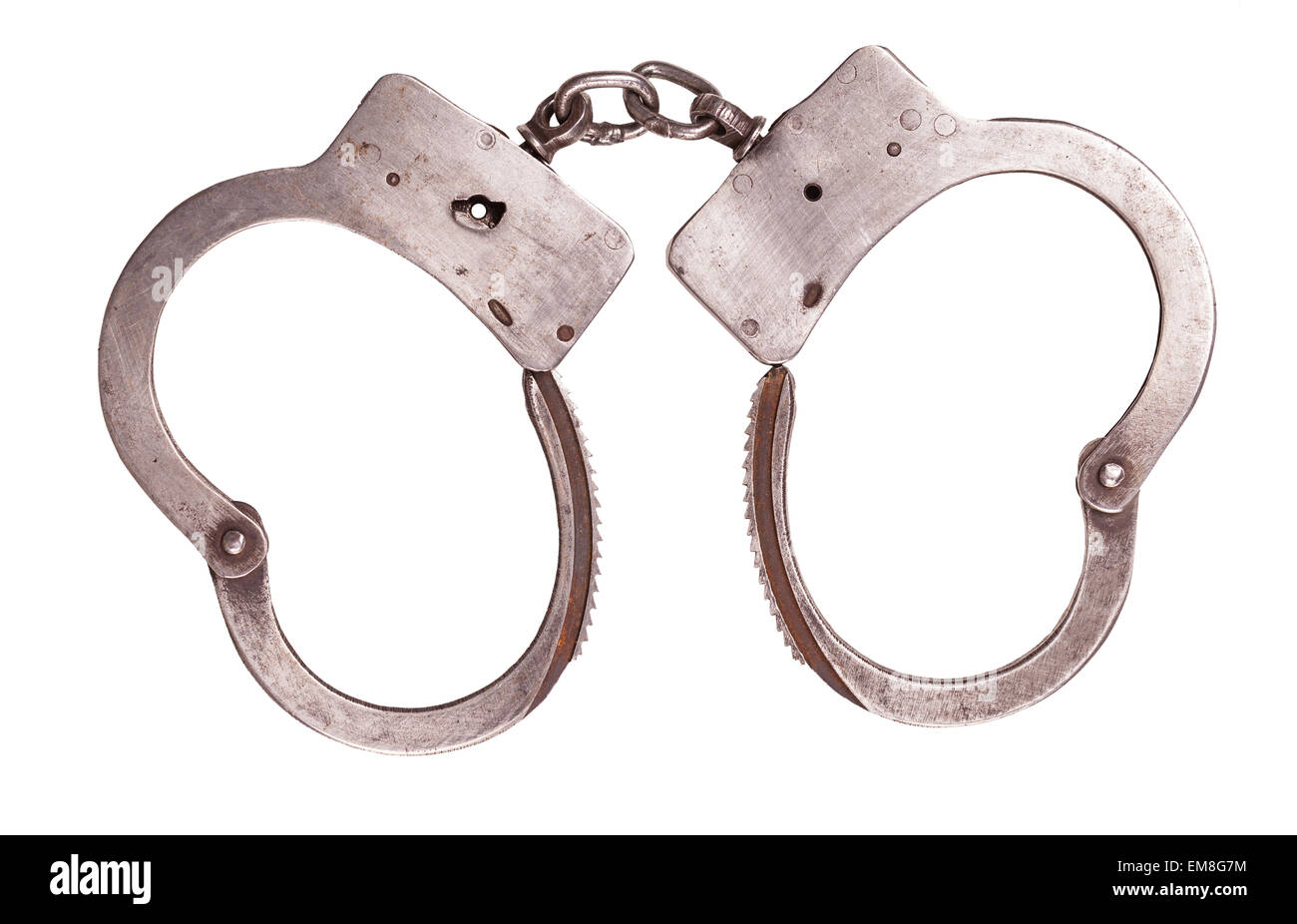 made of metal handcuffs closeup isolated on a white background Stock ...