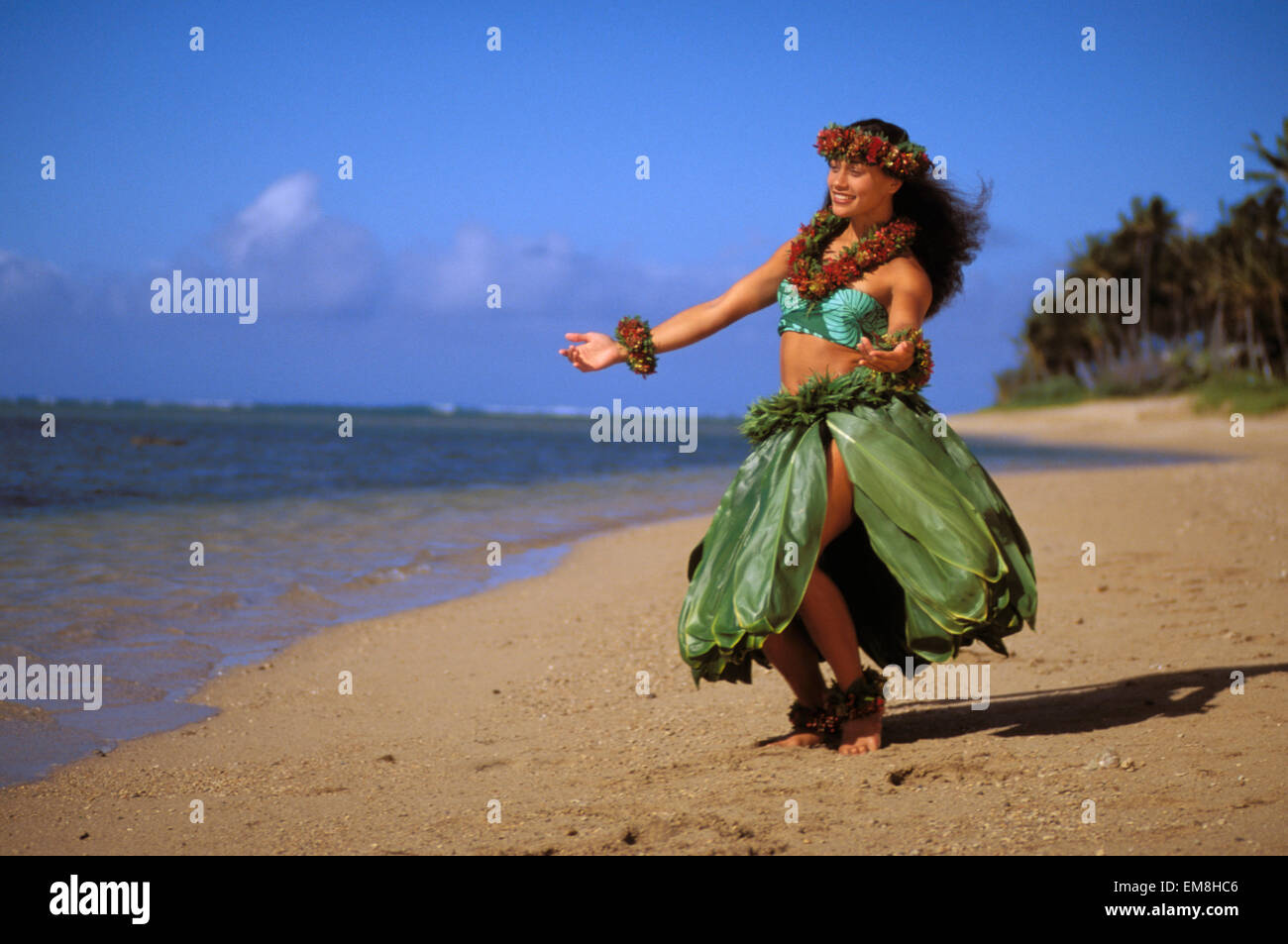 Hawaii, Hula Girl Dancing On The Beach In A Ti-Leaf Skirt Stock Photo ...