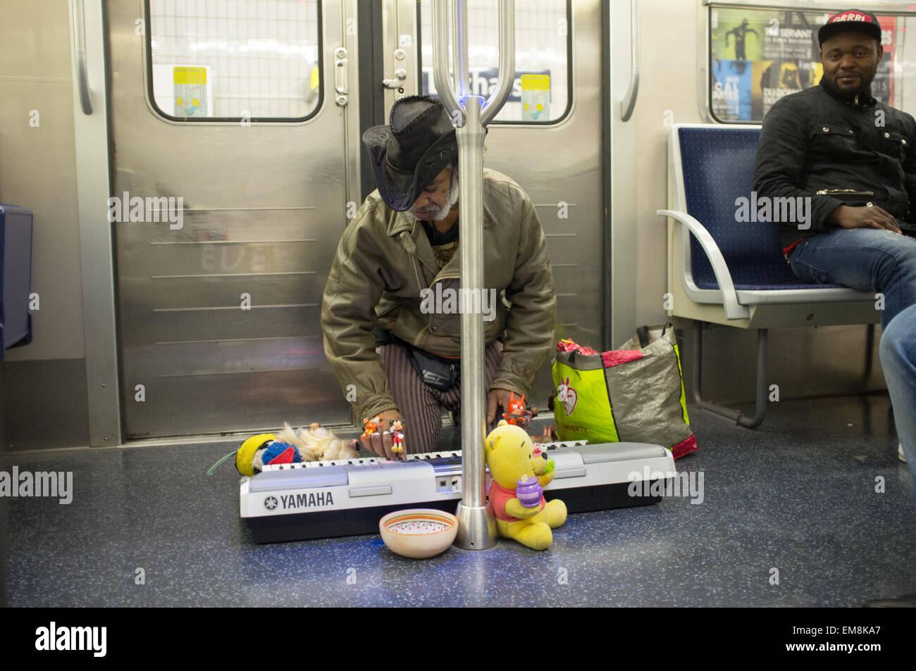 A busker on the Paris subway Stock Photo - Alamy