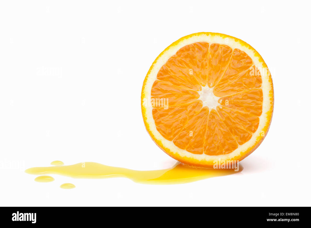 Halved orange with juice Stock Photo - Alamy