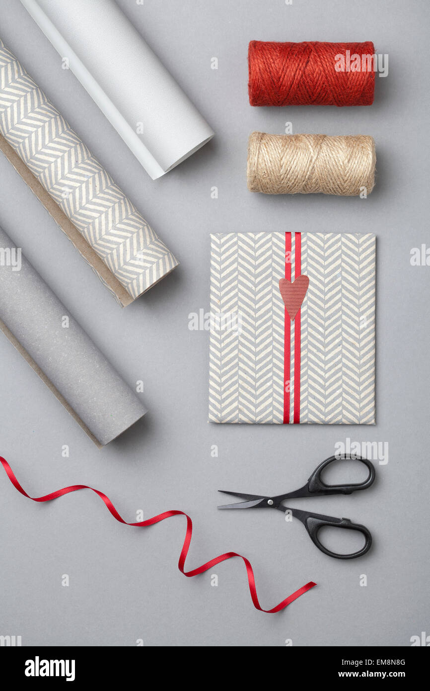 Wrapping paper, thread, card, scissors, ribbon Stock Photo - Alamy