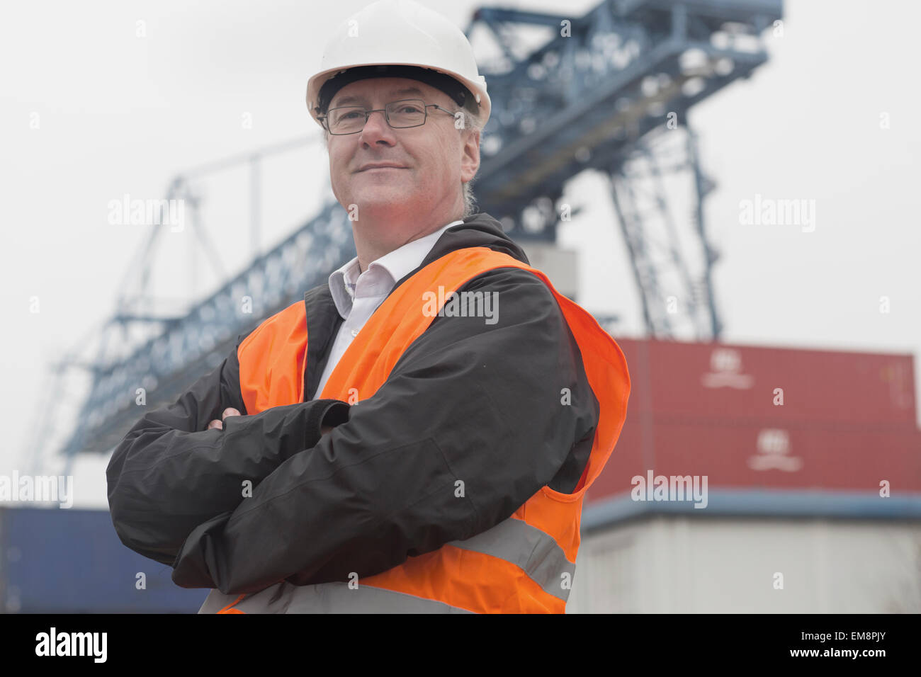 Portrait of dock worker at port Stock Photo - Alamy