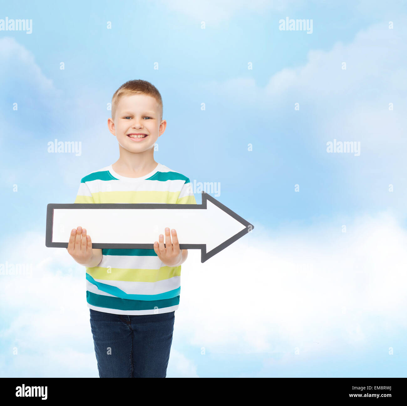 smiling little boy with blank arrow pointing right Stock Photo - Alamy