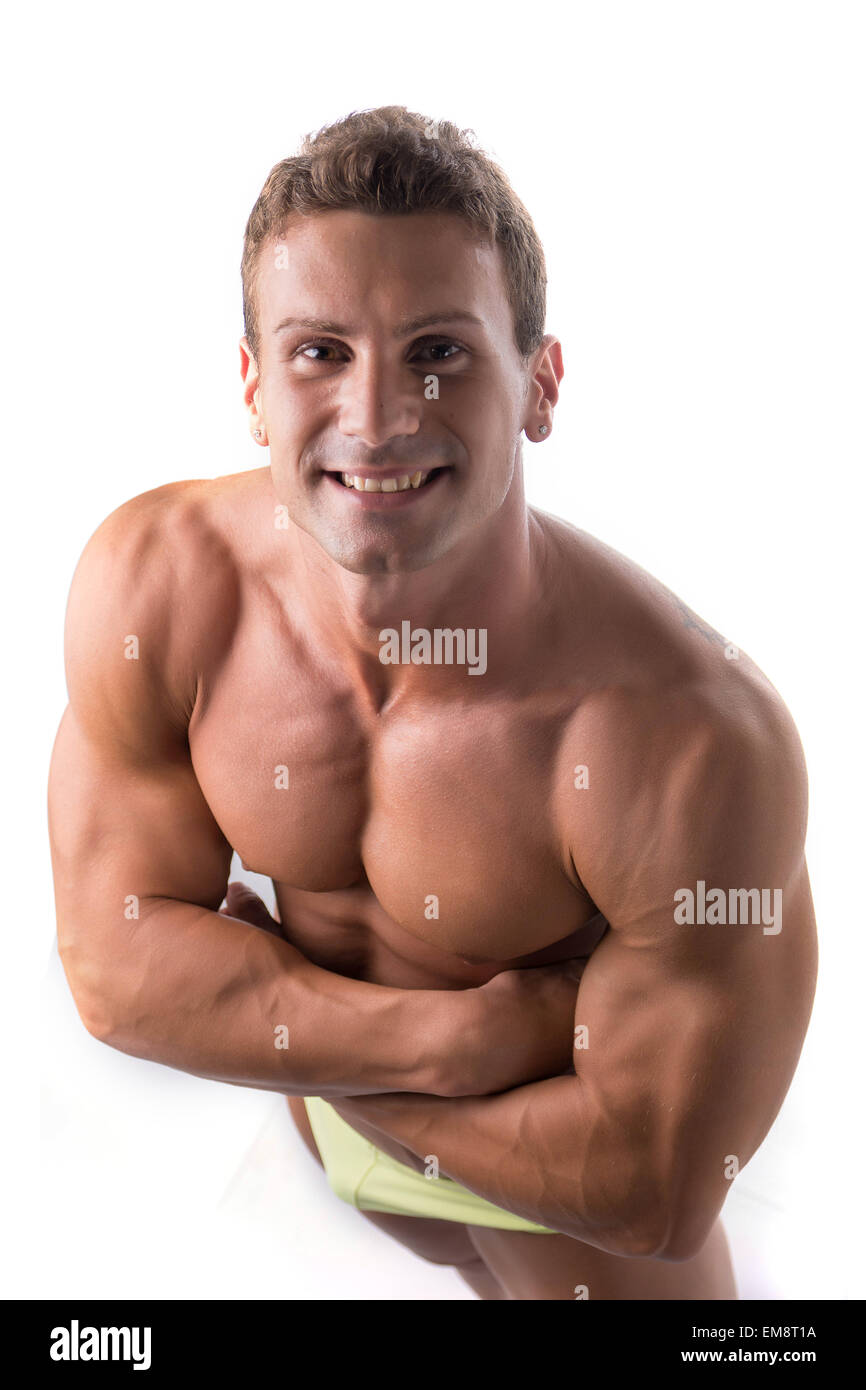Handsome shirtless bodybuilder shot from above, standing isolated Stock ...