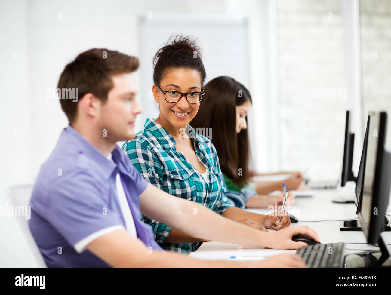 african student with computer studying at school Stock Photo - Alamy