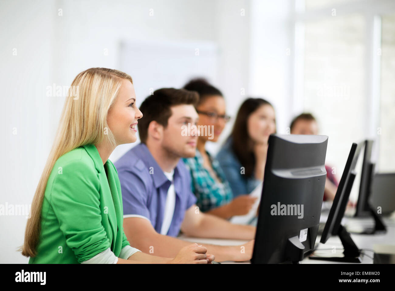 students with computers studying at school Stock Photo - Alamy