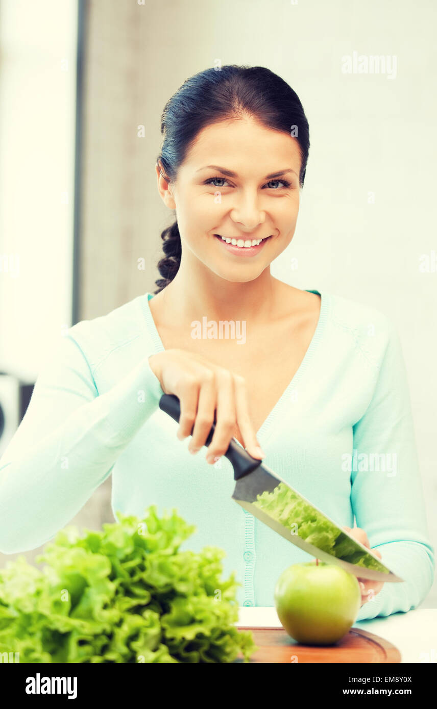beautiful woman in the kitchen Stock Photo - Alamy