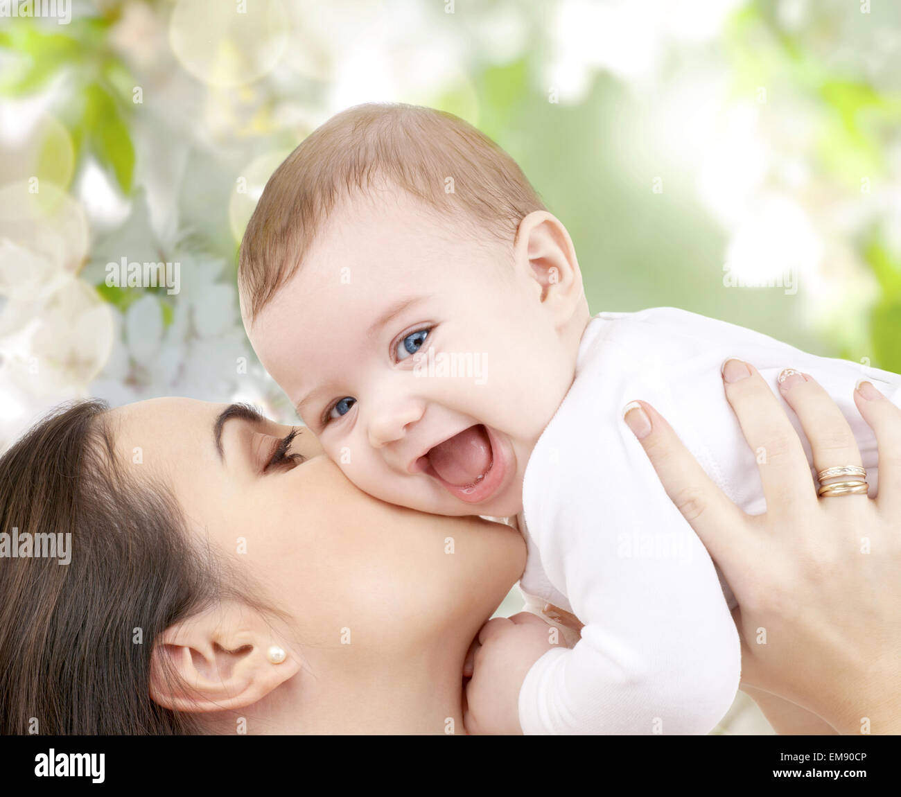 happy laughing baby playing with mother Stock Photo - Alamy