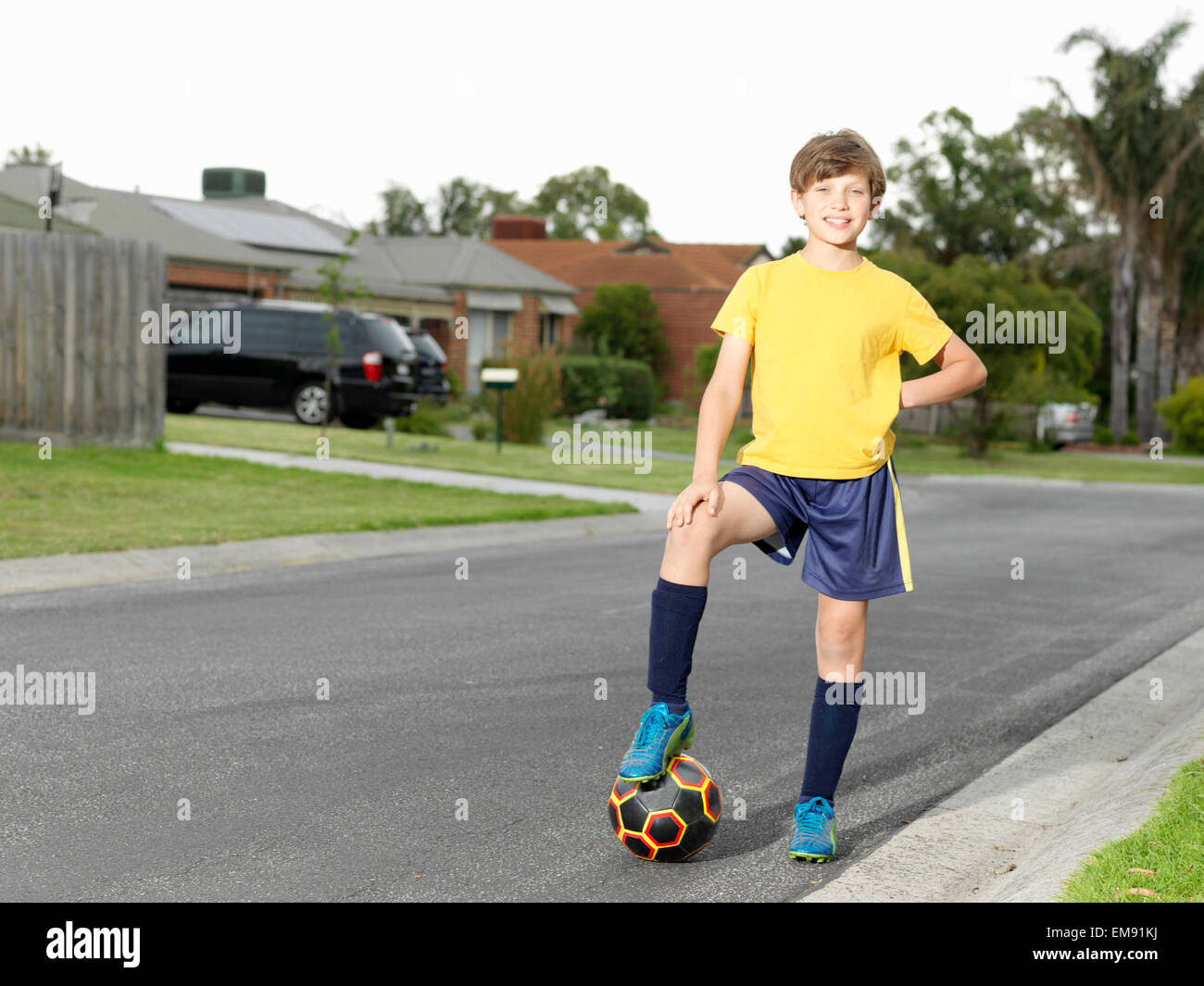 Football foot boy hi-res stock photography and images - Alamy