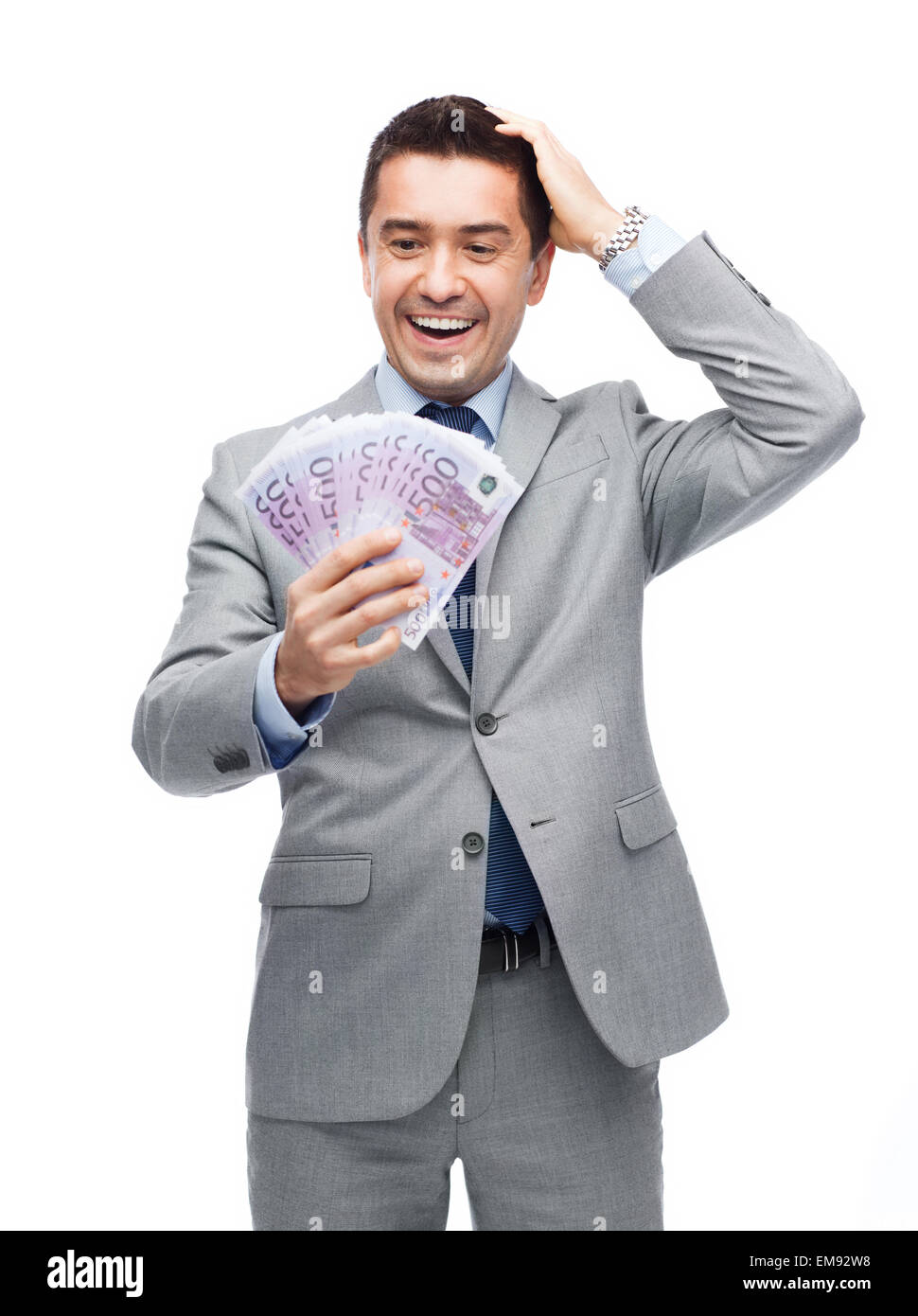 happy laughing businessman with euro money Stock Photo - Alamy