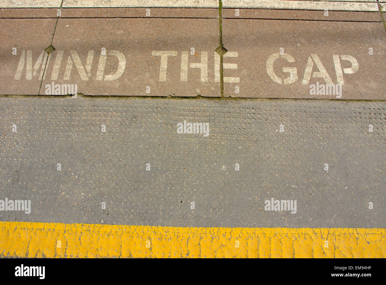 Mind the gap sign warning Stock Photo - Alamy