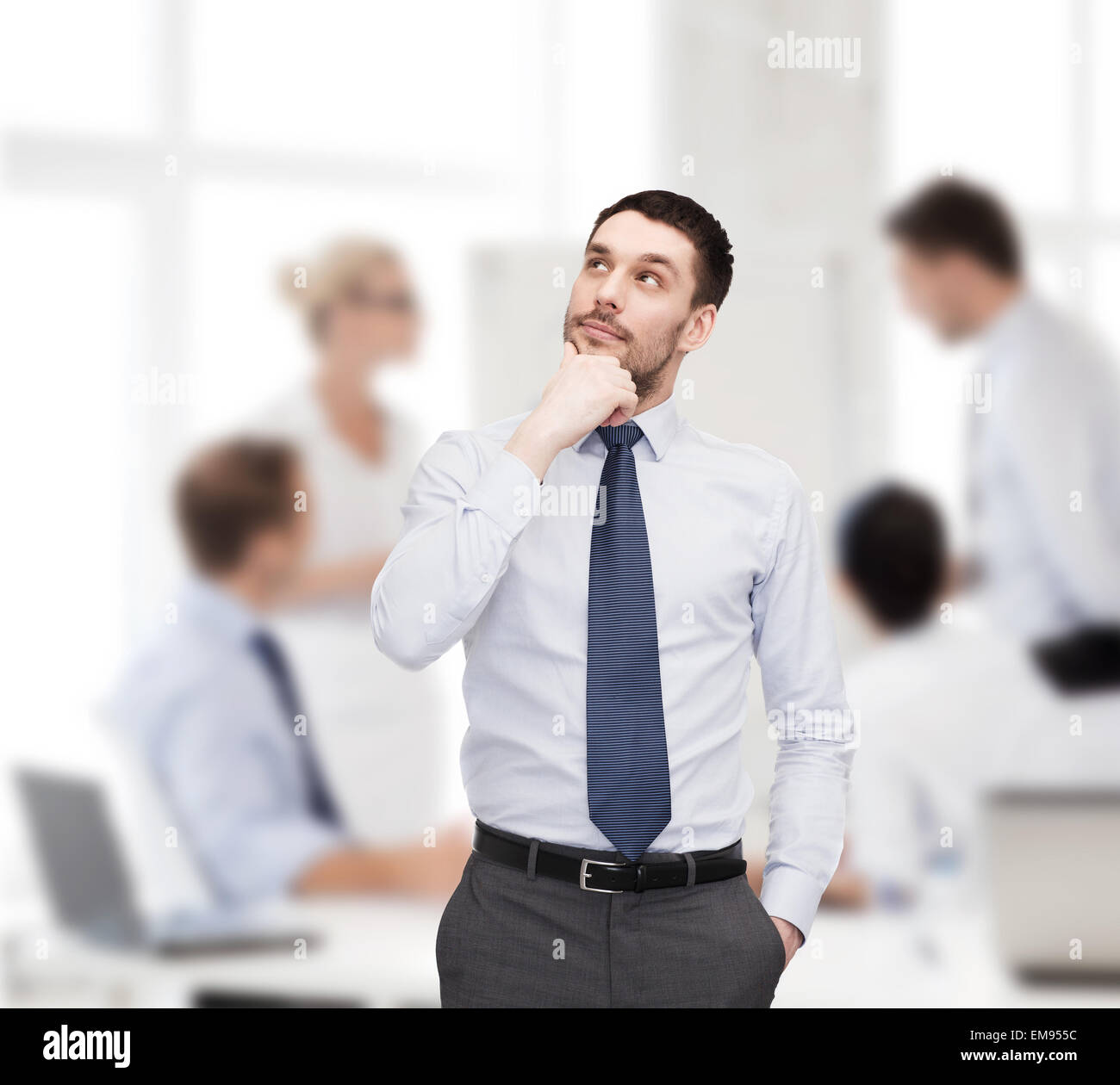 handsome businessman looking up Stock Photo - Alamy