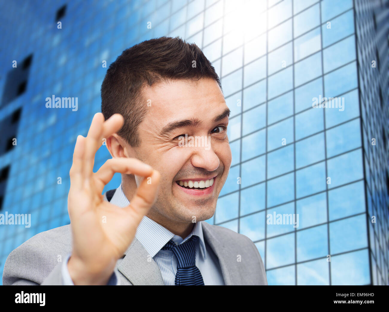 Winking businessman hi-res stock photography and images - Alamy