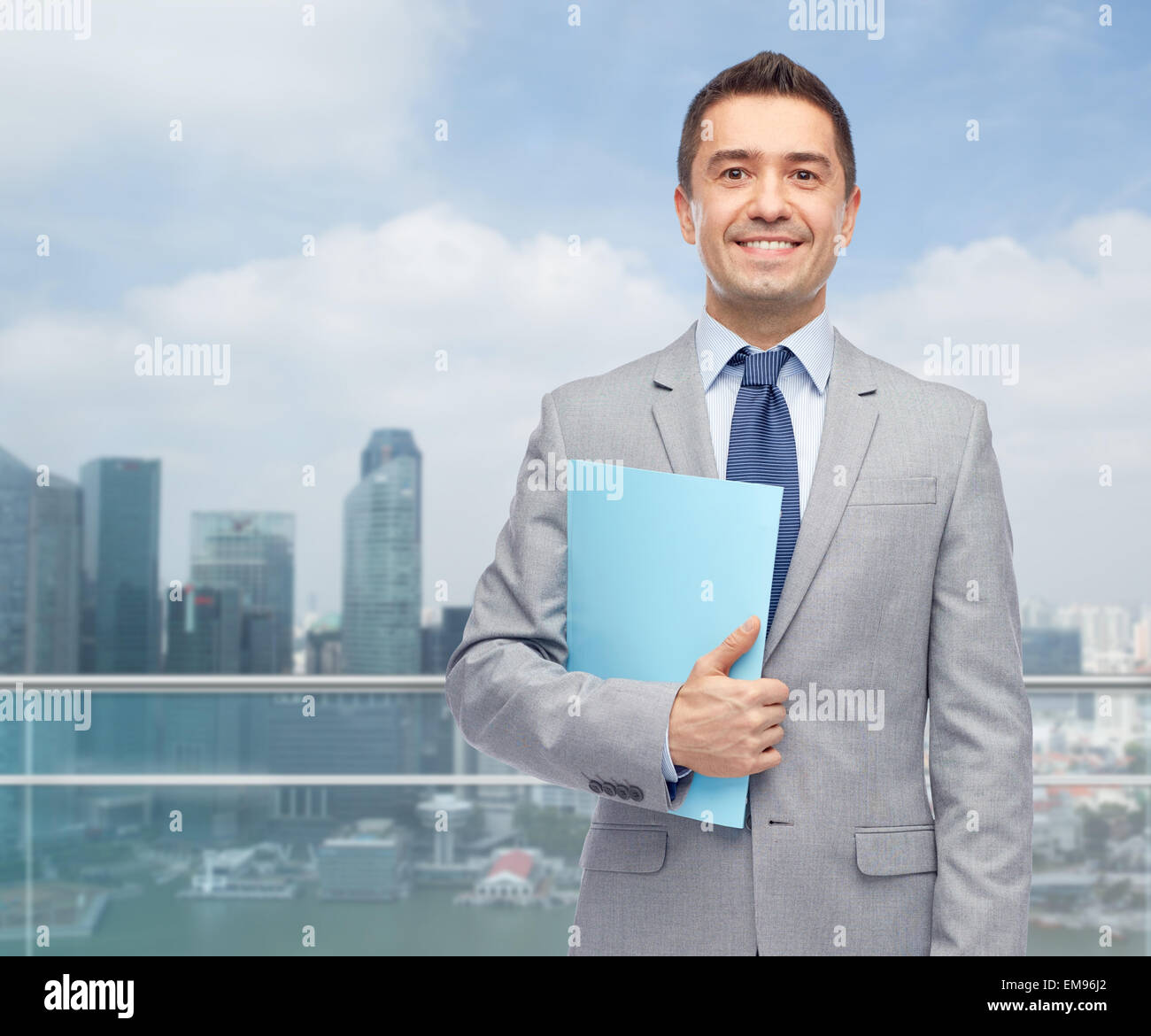 Businessman holding files hi-res stock photography and images - Alamy